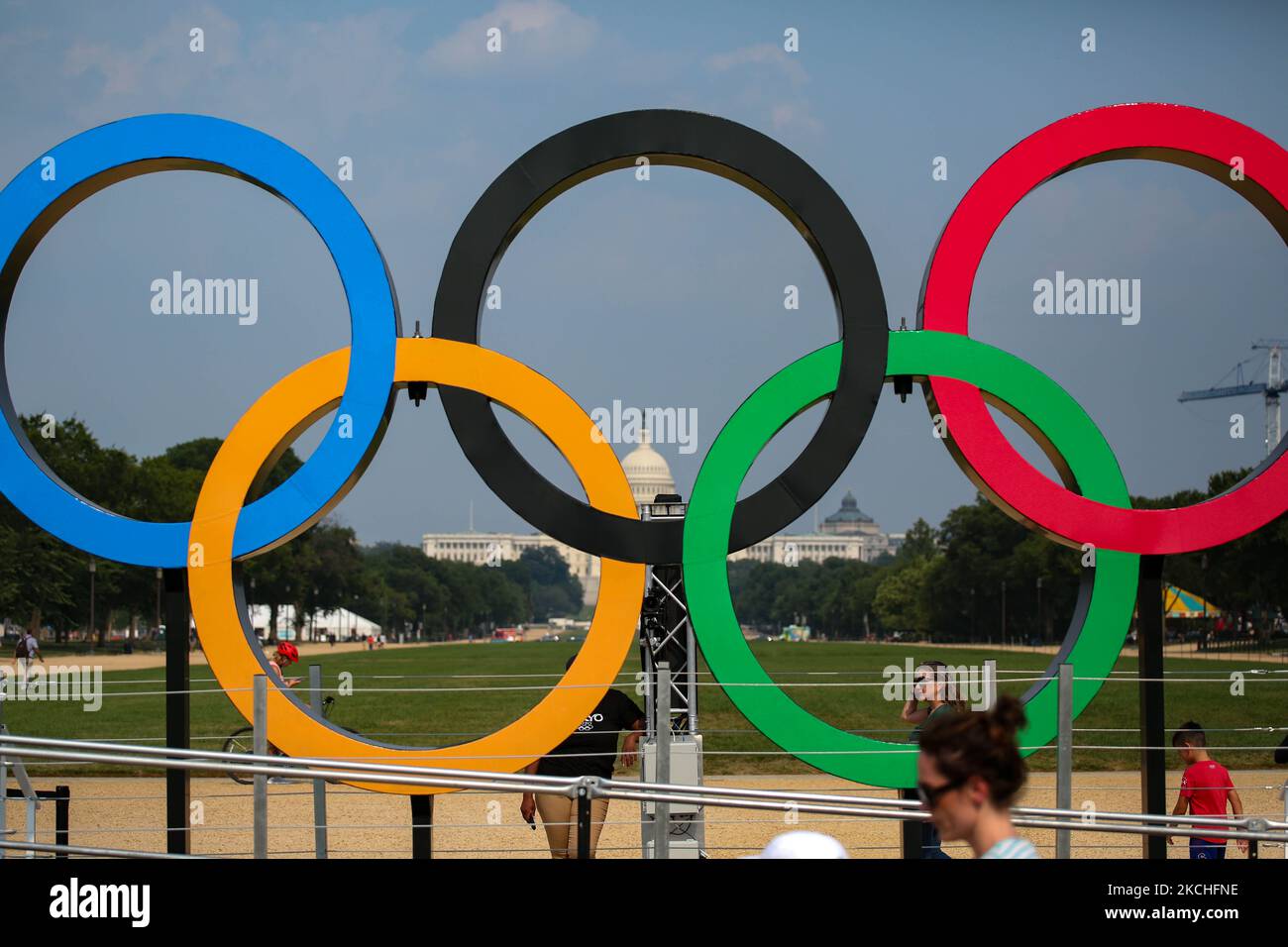 The U.S. Capitol is seen beyond the 'Rings Across America' exhibit by ...