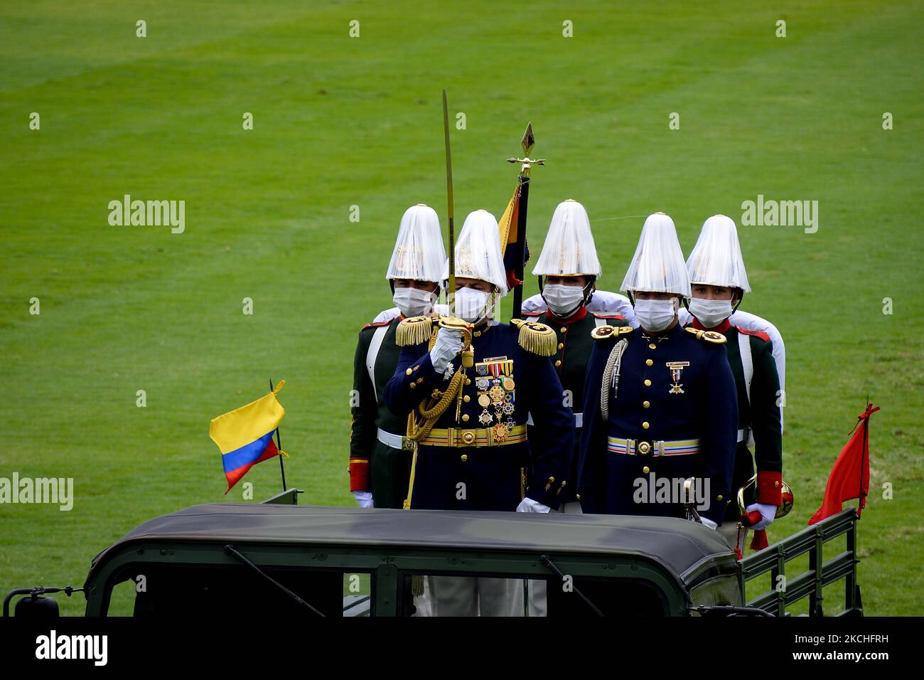 Members of the military forces take part in the military parade to mark ...