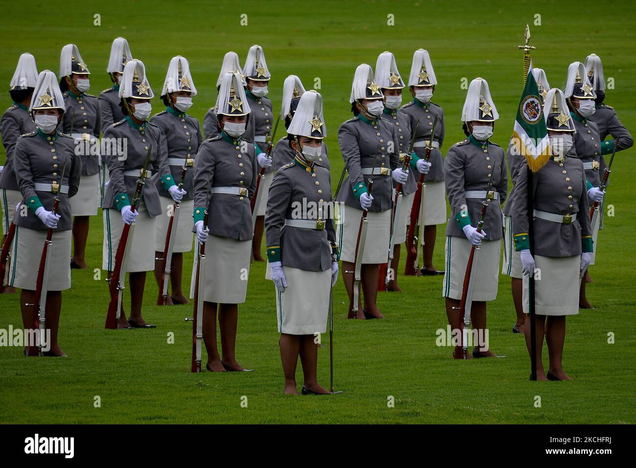 Members of the military forces take part in the military parade to mark ...