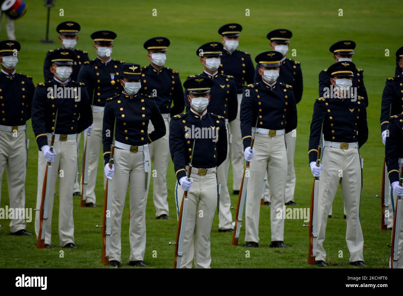 Members of the military forces take part in the military parade to mark ...