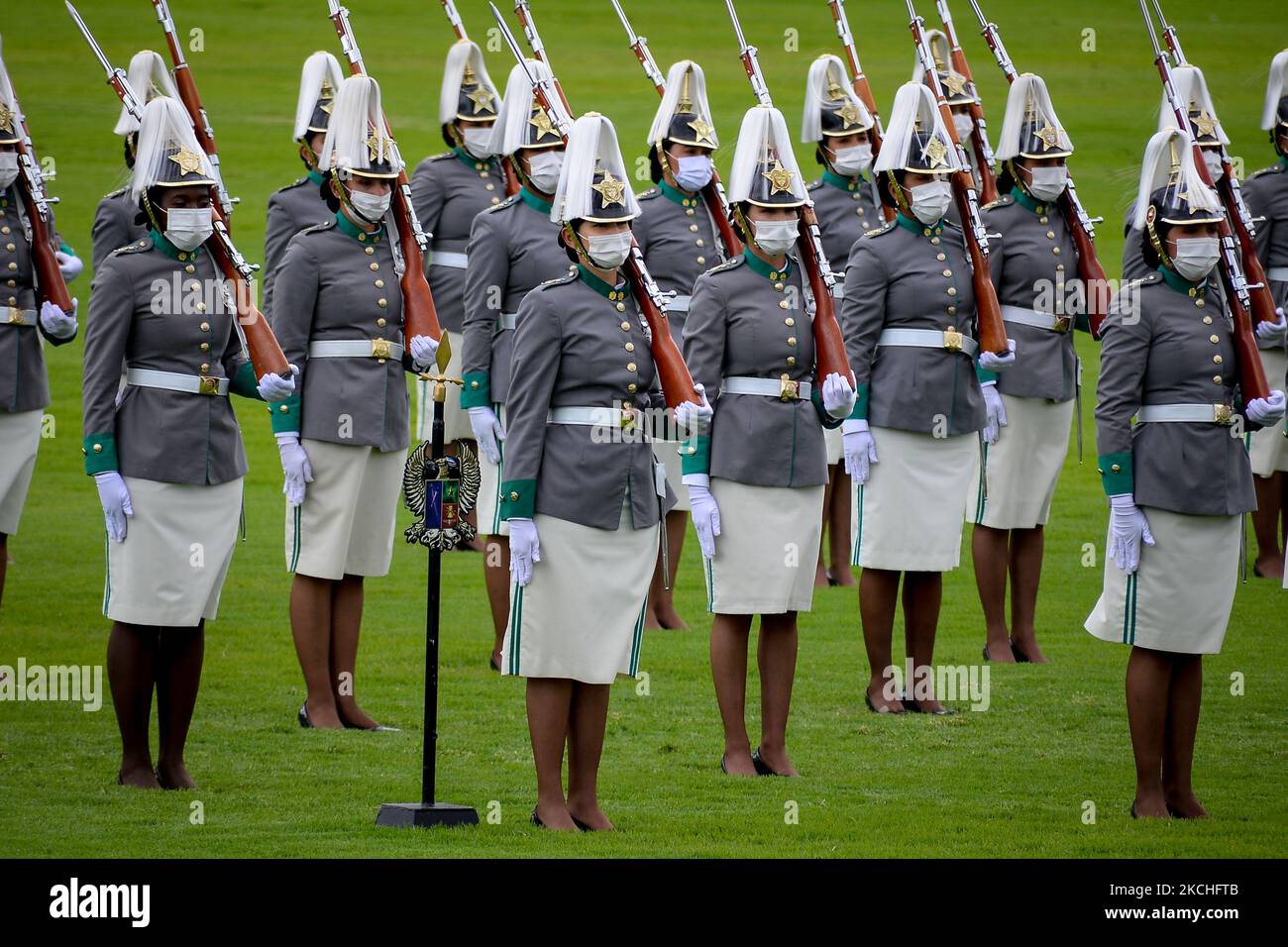 Members of the military forces take part in the military parade to mark ...