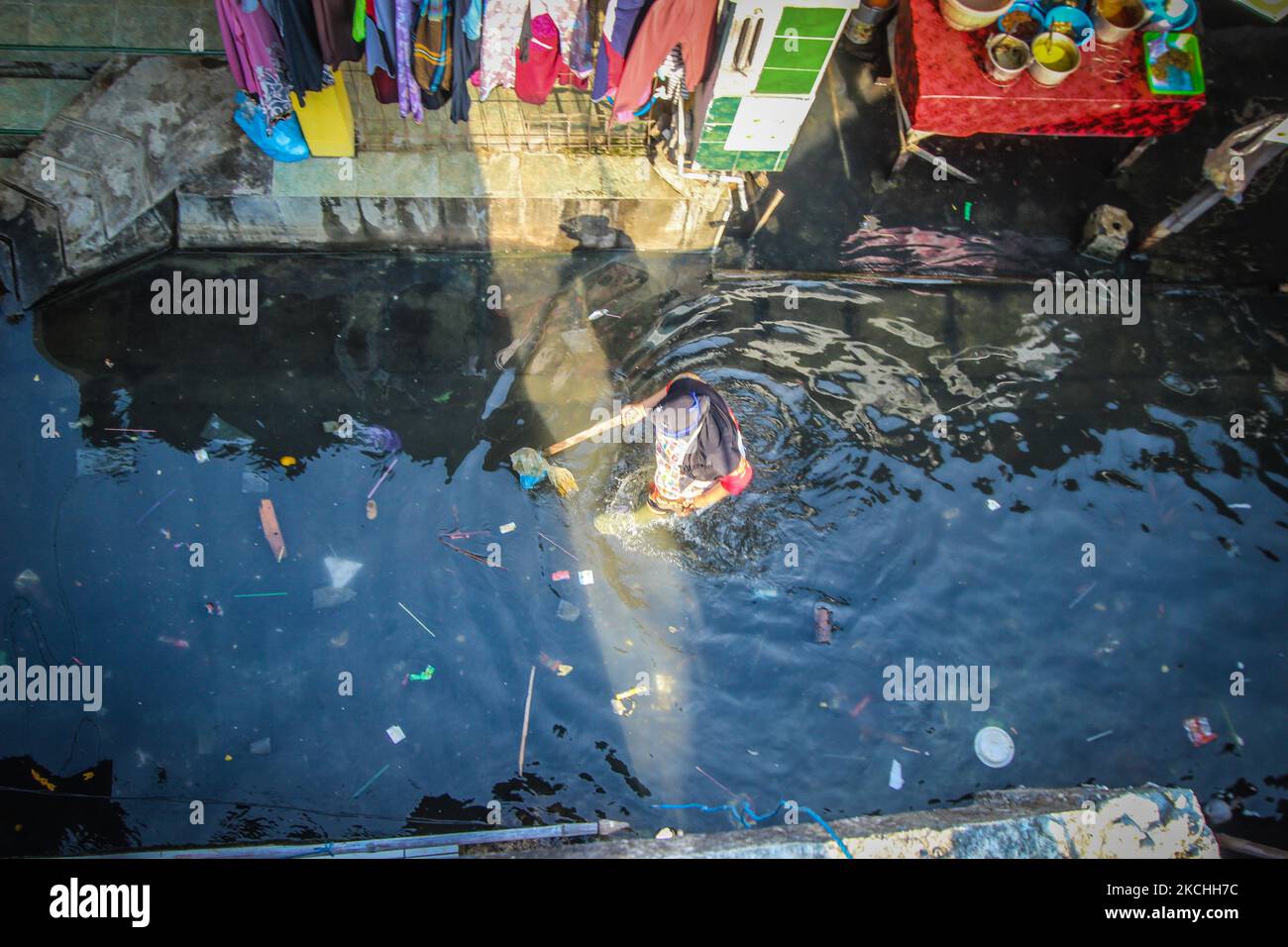 Residents' activities amid tidal flooding in a fishing village in ...