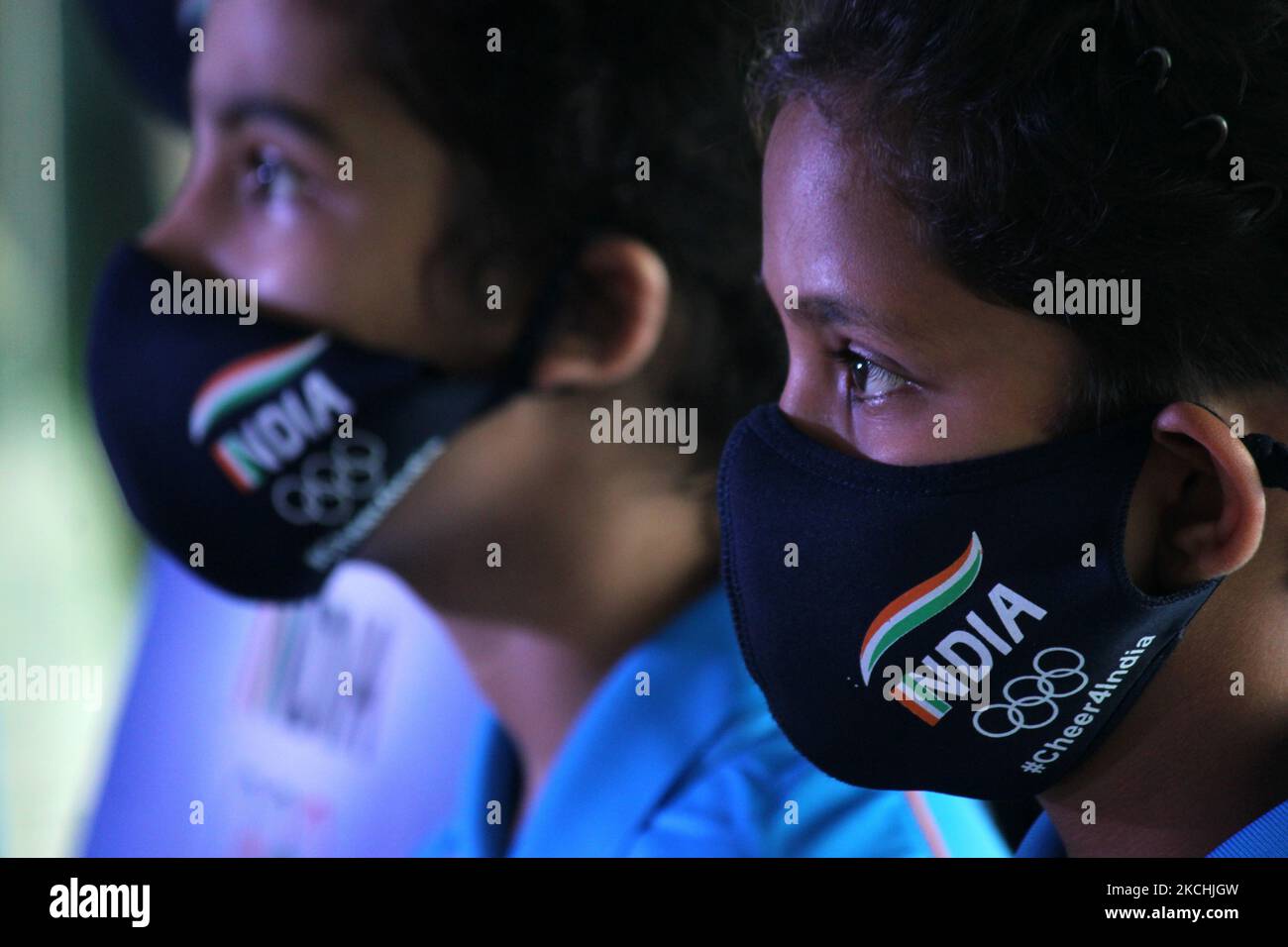 Volunteers wearing protective face masks attend Cheer4India campaign to ...
