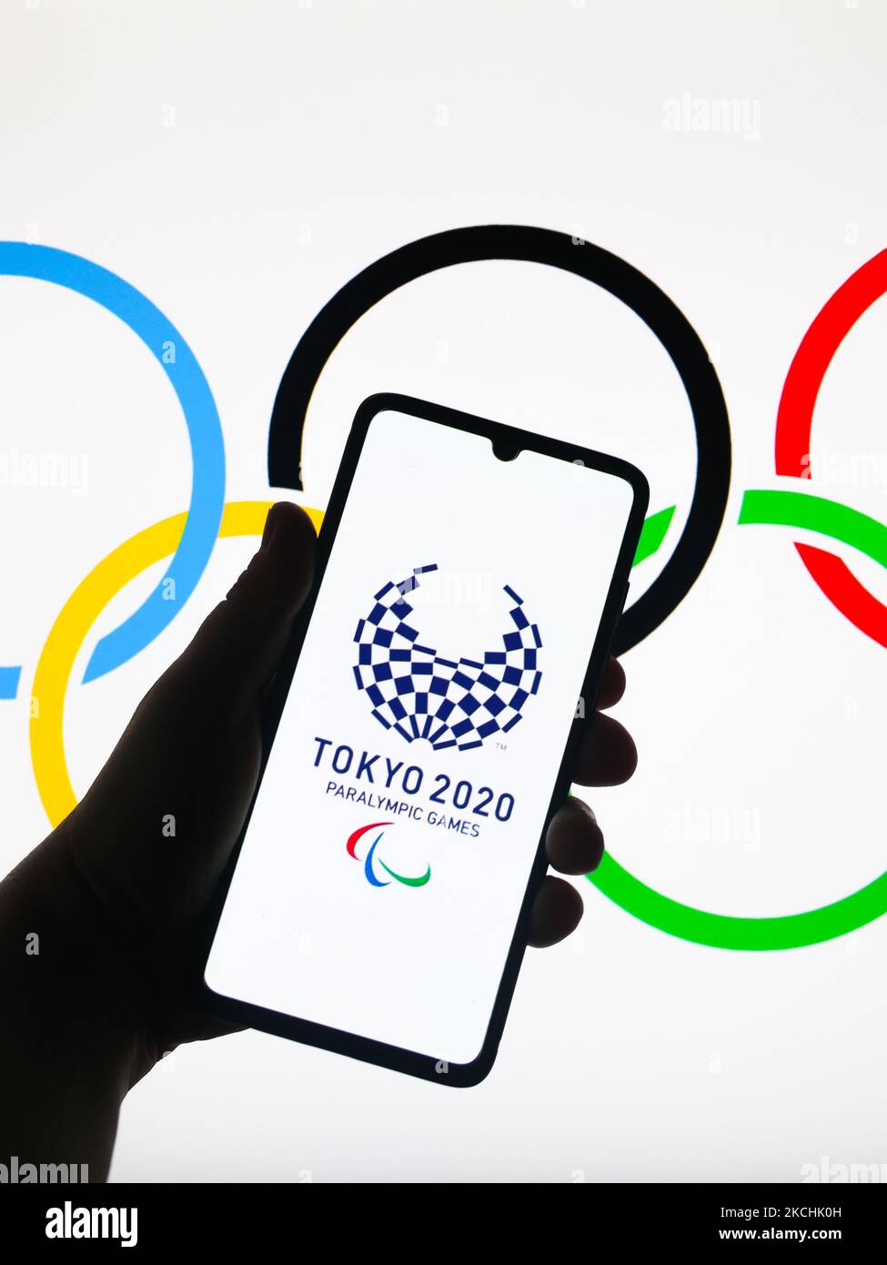 Tokyo 2020 Paralympic Games logo is displayed on a mobile phone screen ...