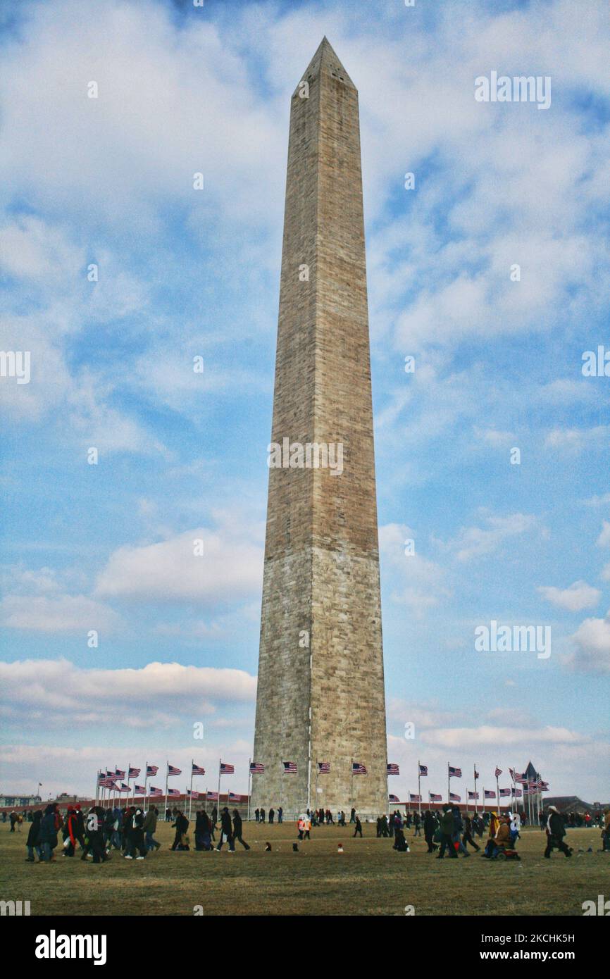 Tourists at the Washington Monument near the west end of the National ...