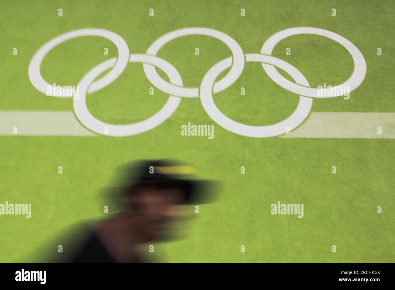 Olympic rings are painted on a front wall of the primary school in ...