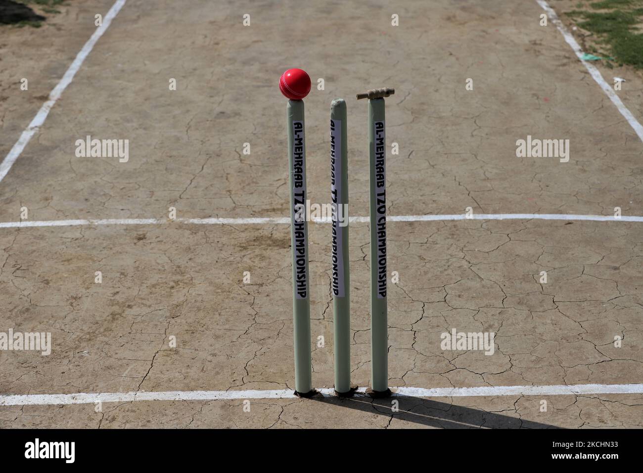 A Pink Cricket Ball is kept on the Stumps during drinks break as a ...