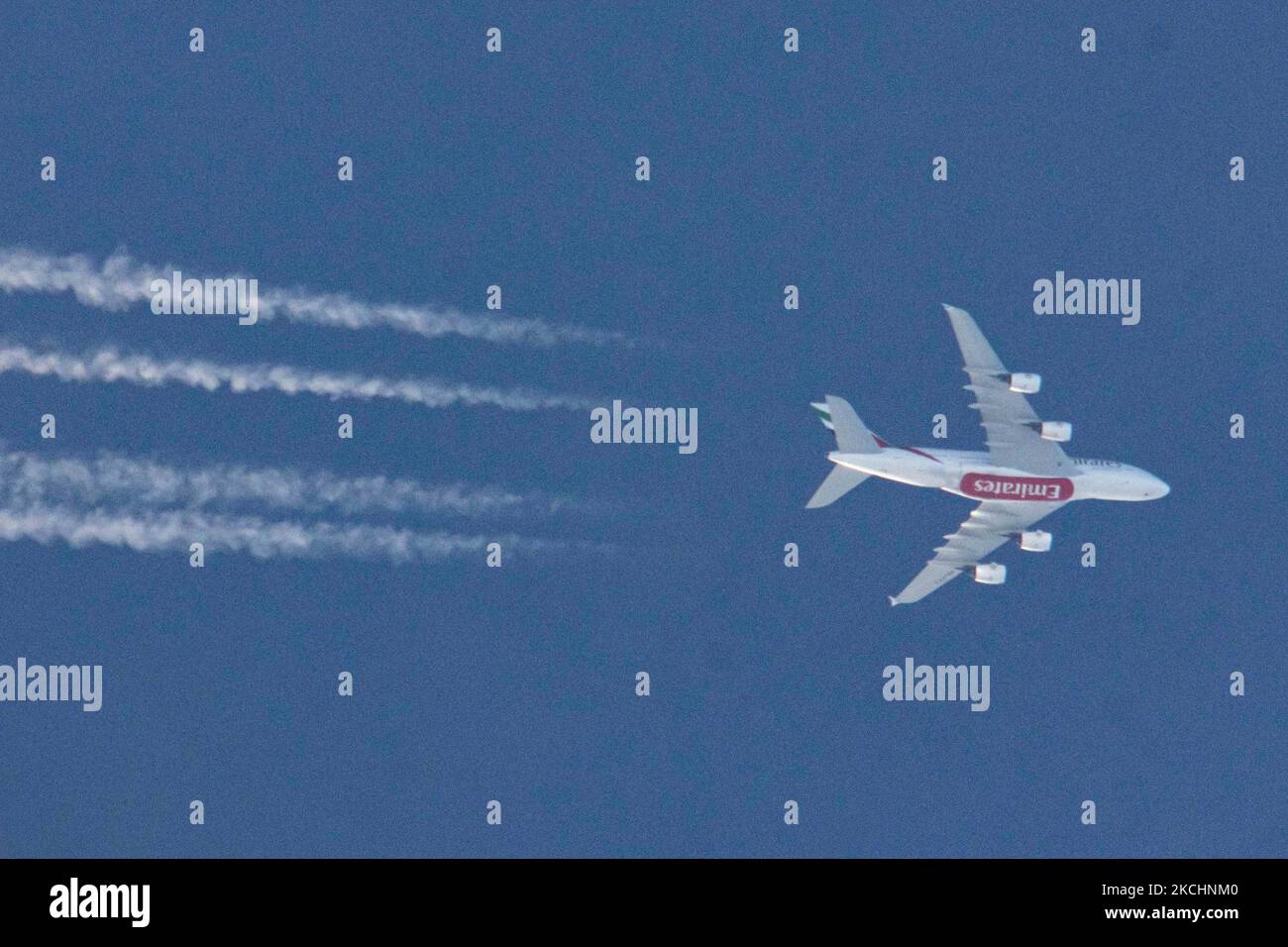Emirates Airbus A380 aircraft as seen flying in the blue summer sky ...