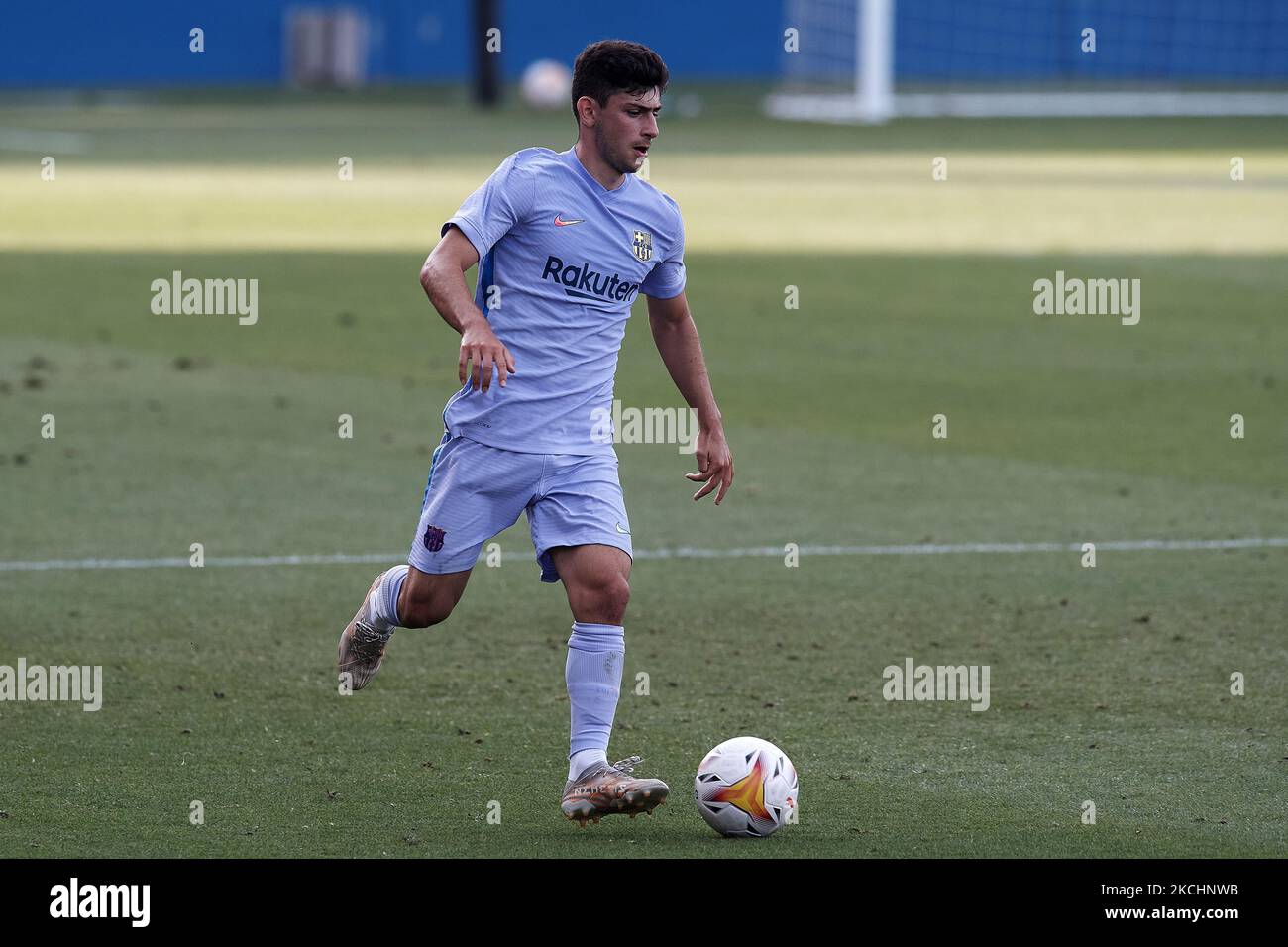 Demir of Barcelona runs with the ball during the pre-season friendly ...
