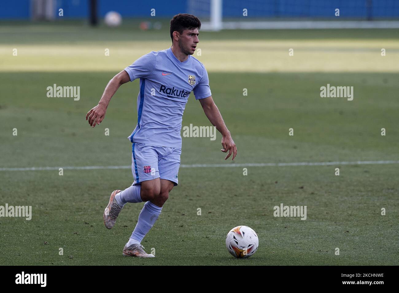 Demir of Barcelona runs with the ball during the pre-season friendly ...