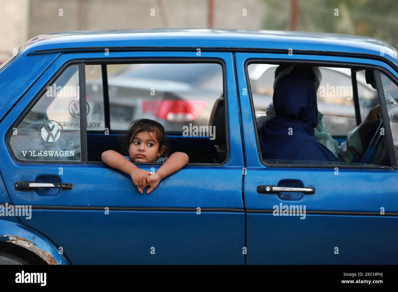 Palestinians participate in an event to mark the Palestinian ...