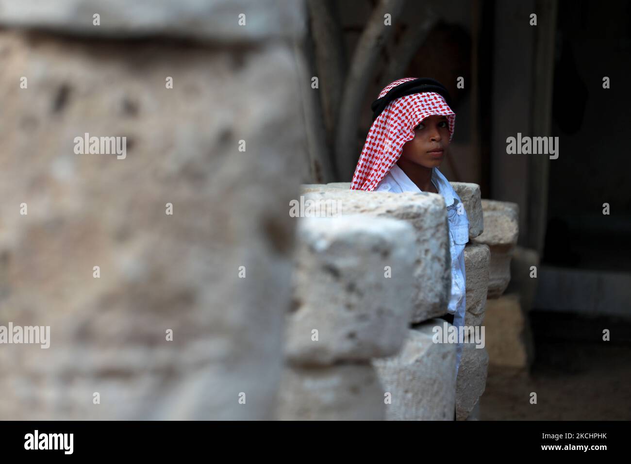 Palestinians participate in an event to mark the Palestinian ...