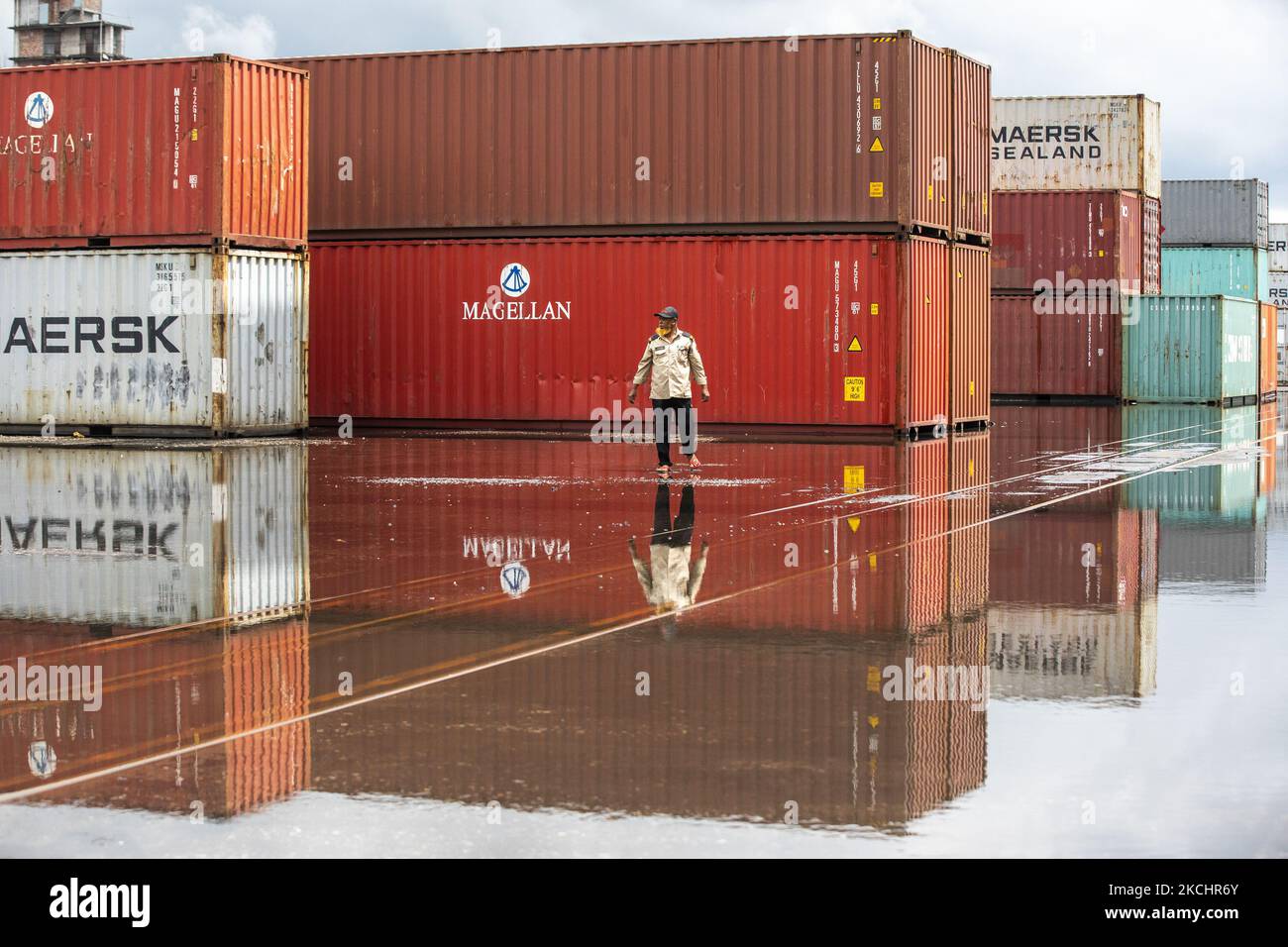 A security personnel walks in the premises of a Inland Container Depot ...