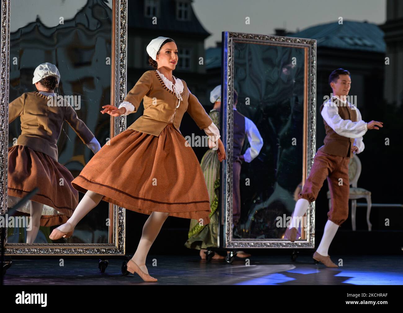 Members of the Cracovia Danza ballet dressed in costumes from the ...