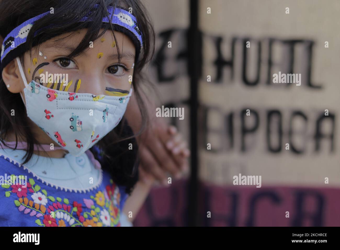 A pre-hispanic girl dancer during the 696th anniversary of the founding ...