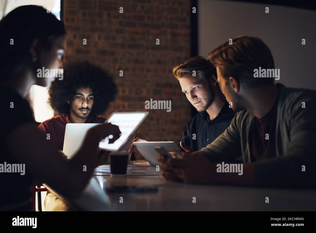 Doing business, together. a group of young designers having a ...