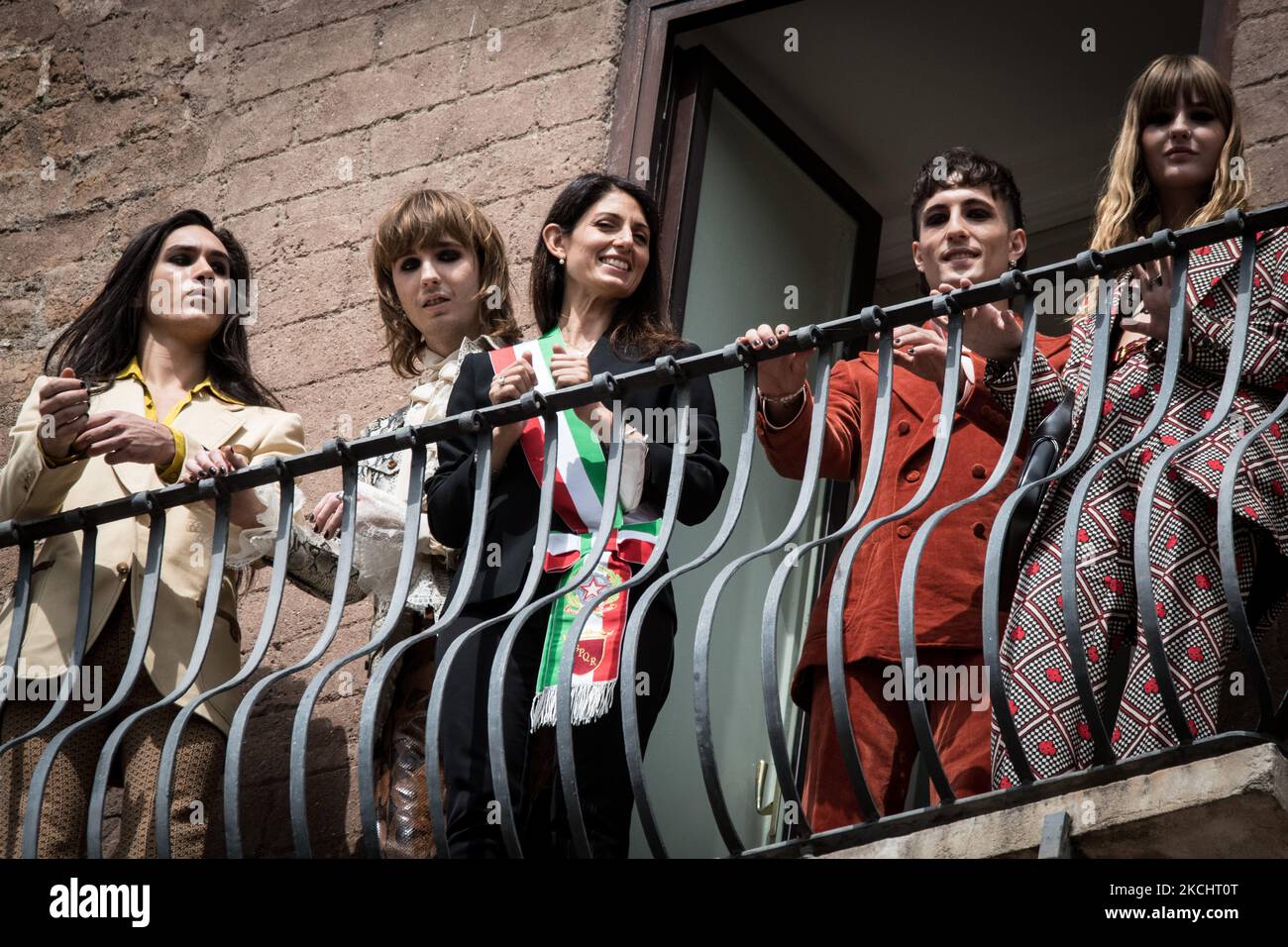 Mayor's Rome, Virginia Raggi (C) and members of the band Maneskin ...