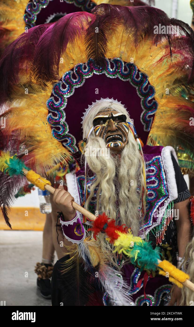 Bolivian masked dancer dressed in a traditional costume dancing the ...