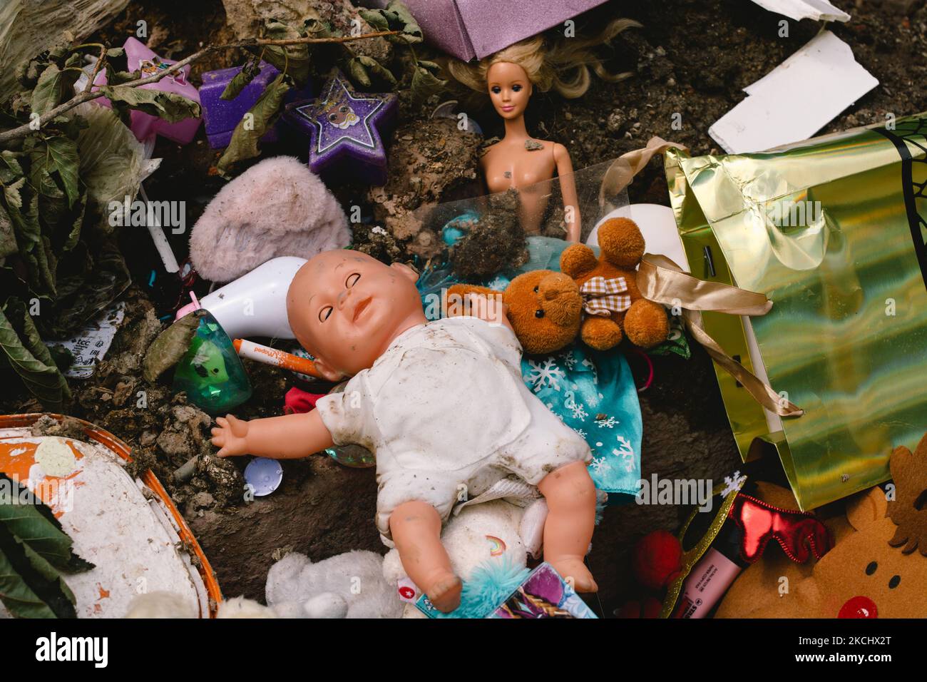 some toys are seen with other destroyed items on the street in Stolberg ...