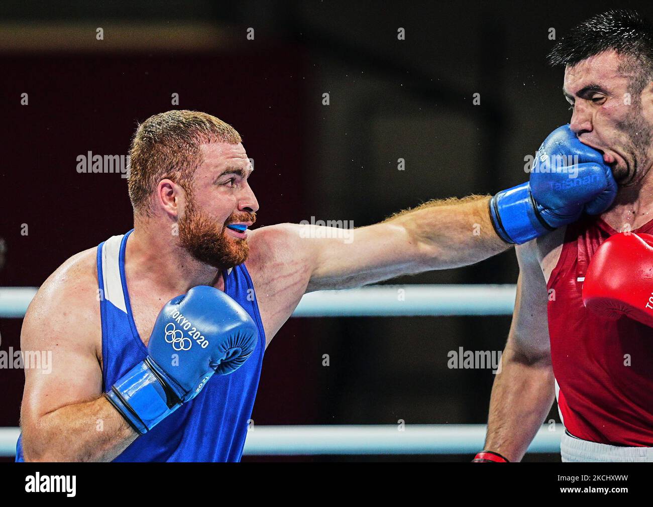 Bakhodir Jalolov from Uzbekistan and Mahammad Abdullayev from Azerbijdan during pre final boxing ...
