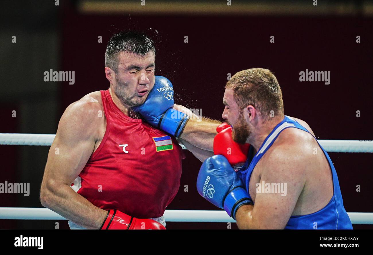 Bakhodir Jalolov from Uzbekistan and Mahammad Abdullayev from Azerbijdan during pre final boxing ...