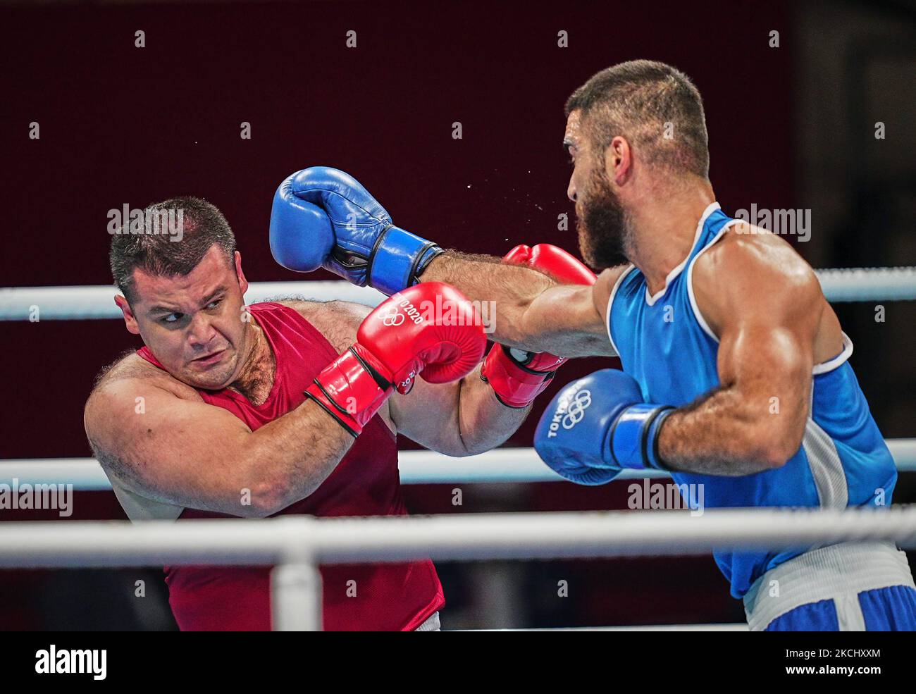 Mourad Aliev from France and Siyovush Zukhurov from Tajikistan during ...