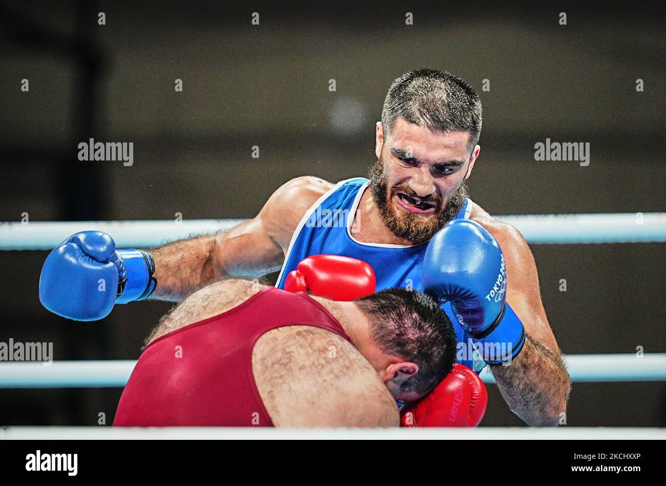 Mourad Aliev from France and Siyovush Zukhurov from Tajikistan during ...