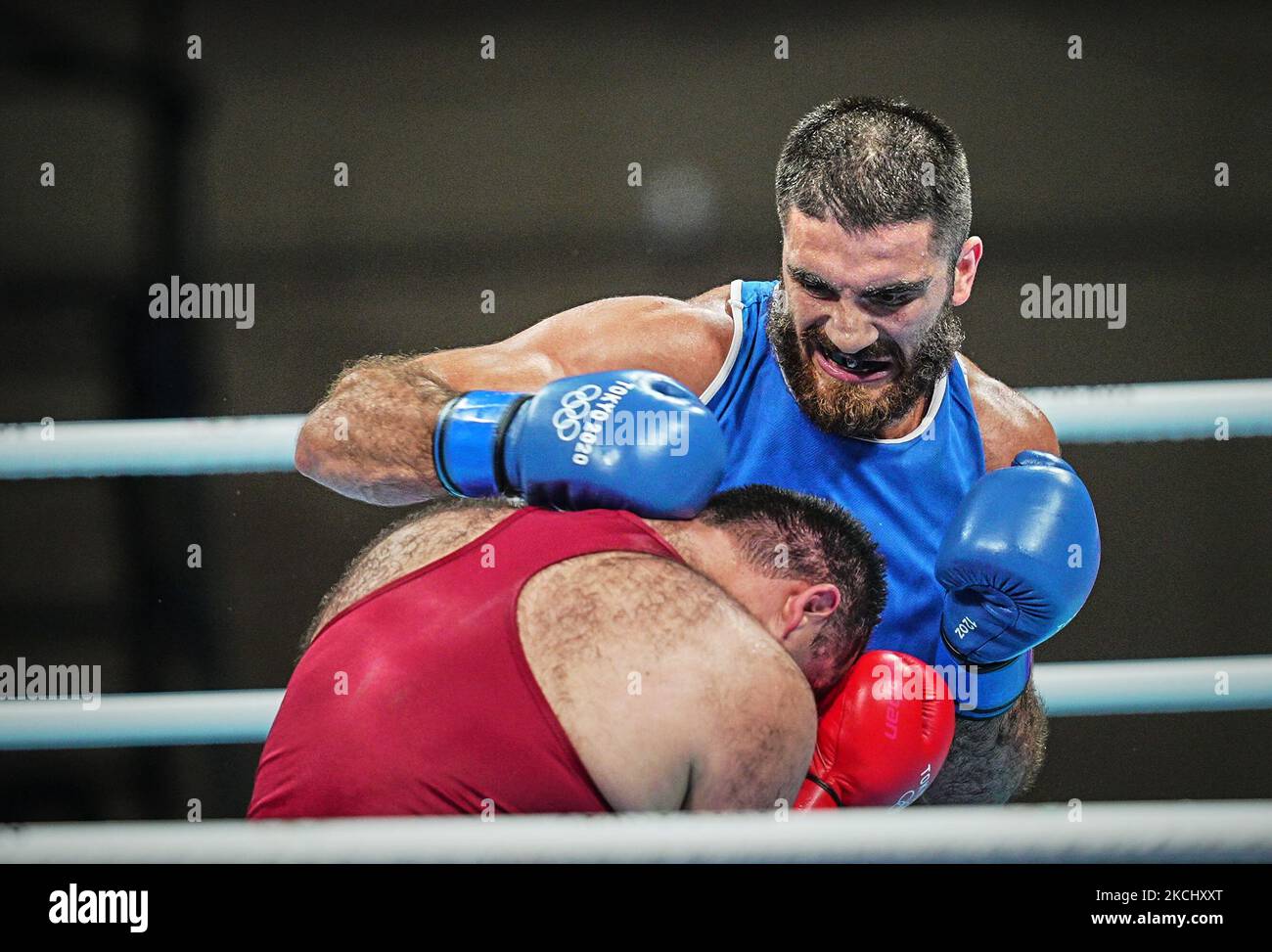 Mourad Aliev from France and Siyovush Zukhurov from Tajikistan during ...