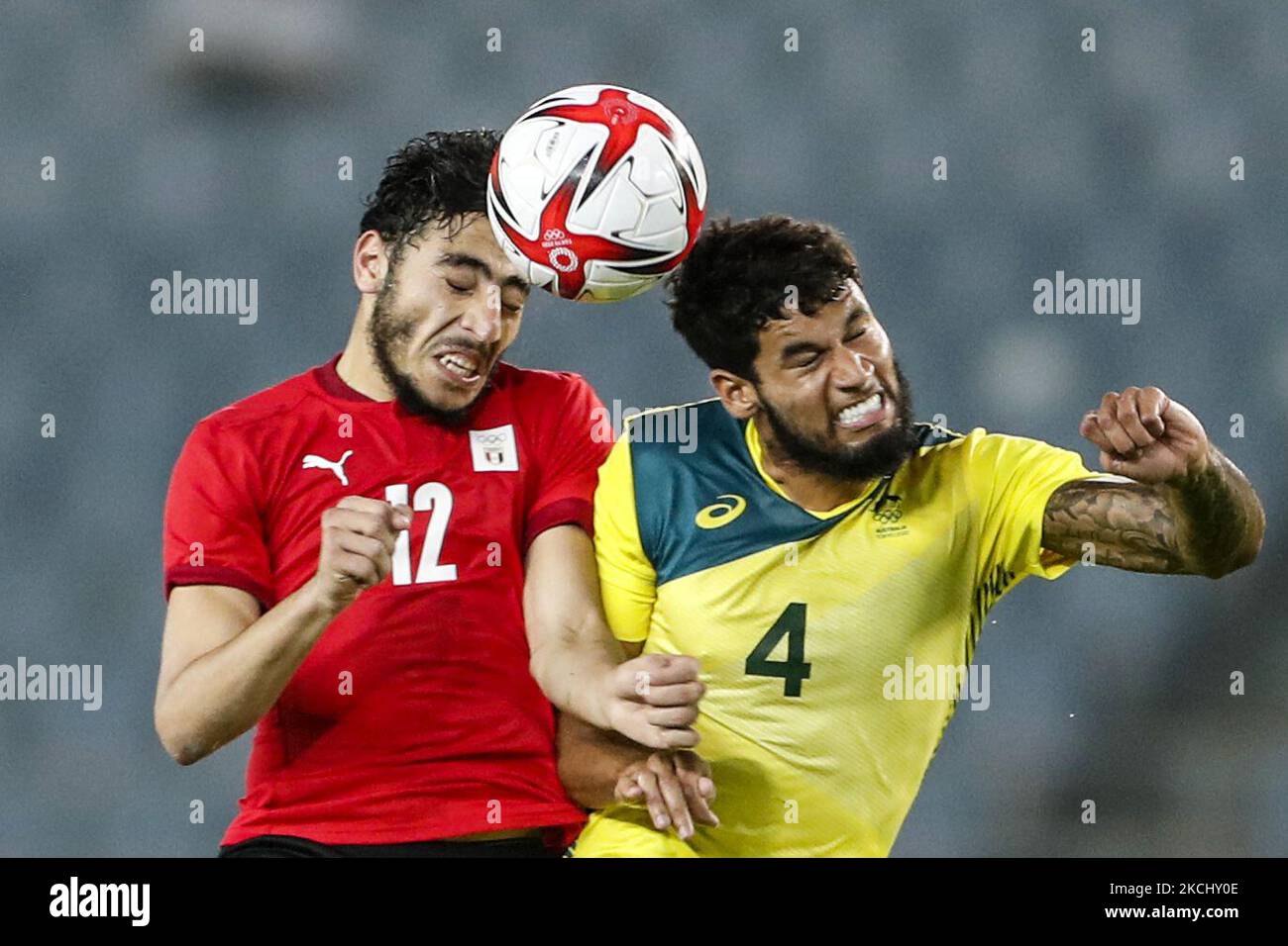 (12) Akram TAWFIK of Team Egypt is challenged by (4) Jay RICH-BAGHUELOU ...
