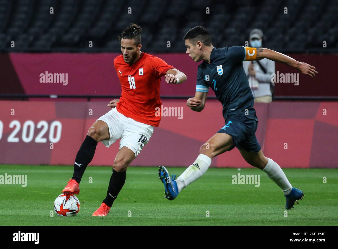 (10) Ramadan SOBHI of Team Egypt is challenged by (2) Nehuen PEREZ of ...