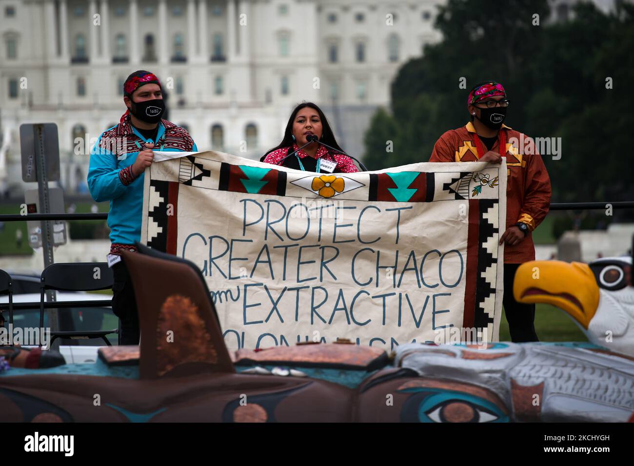 A group of citizens and tribal leaders rally on the National Mall in ...