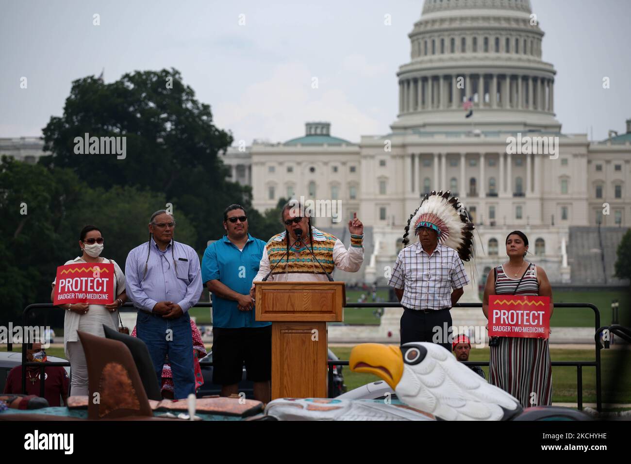 A group of citizens and tribal leaders rally on the National Mall in ...