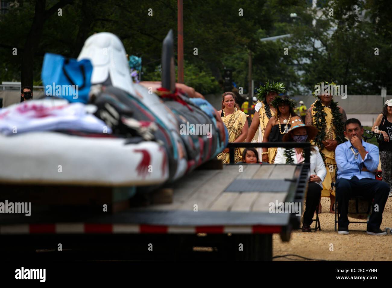 A group of citizens and tribal leaders rally on the National Mall in ...