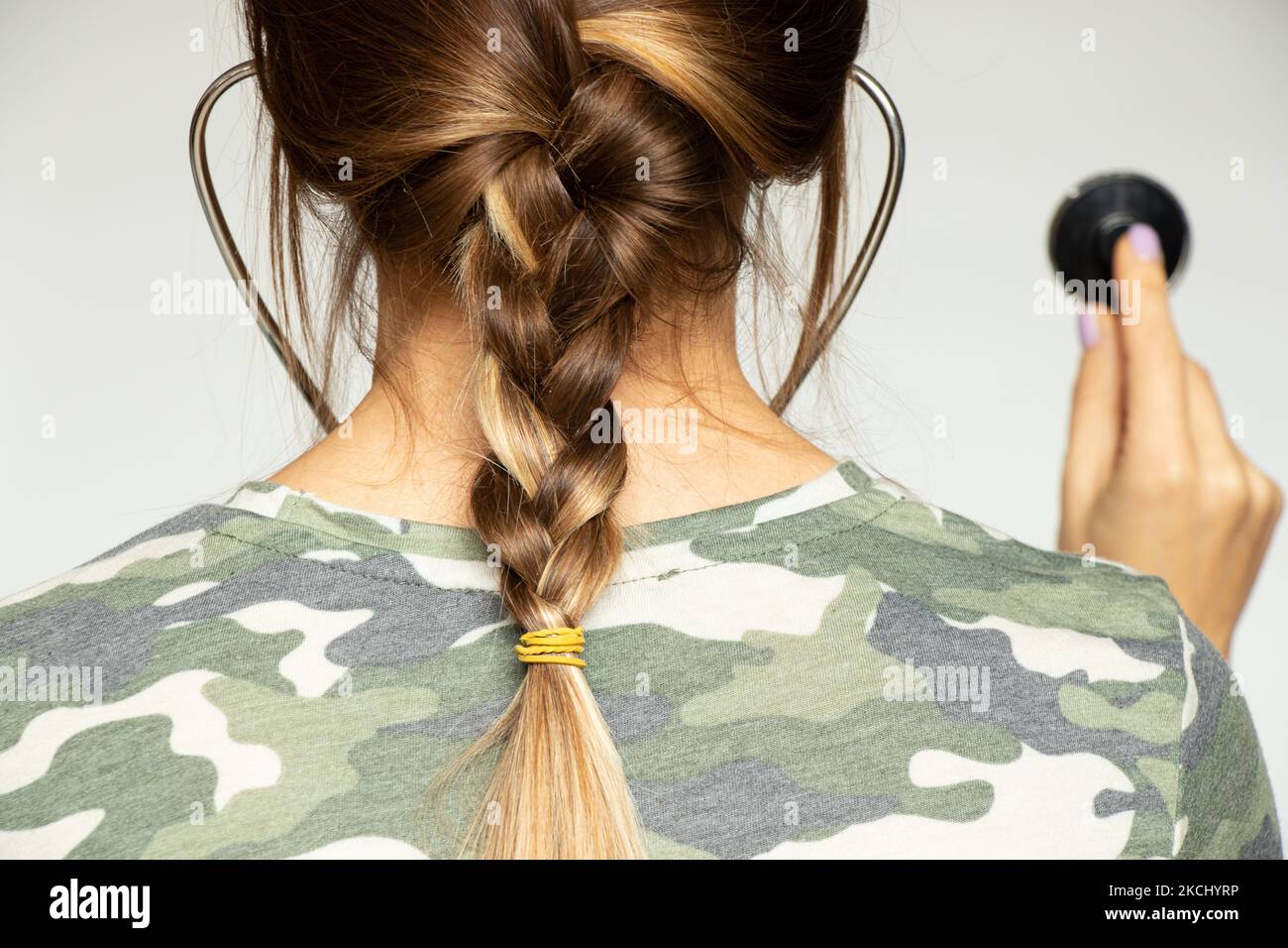 Military nurse with stethoscope over isolated background , military ...