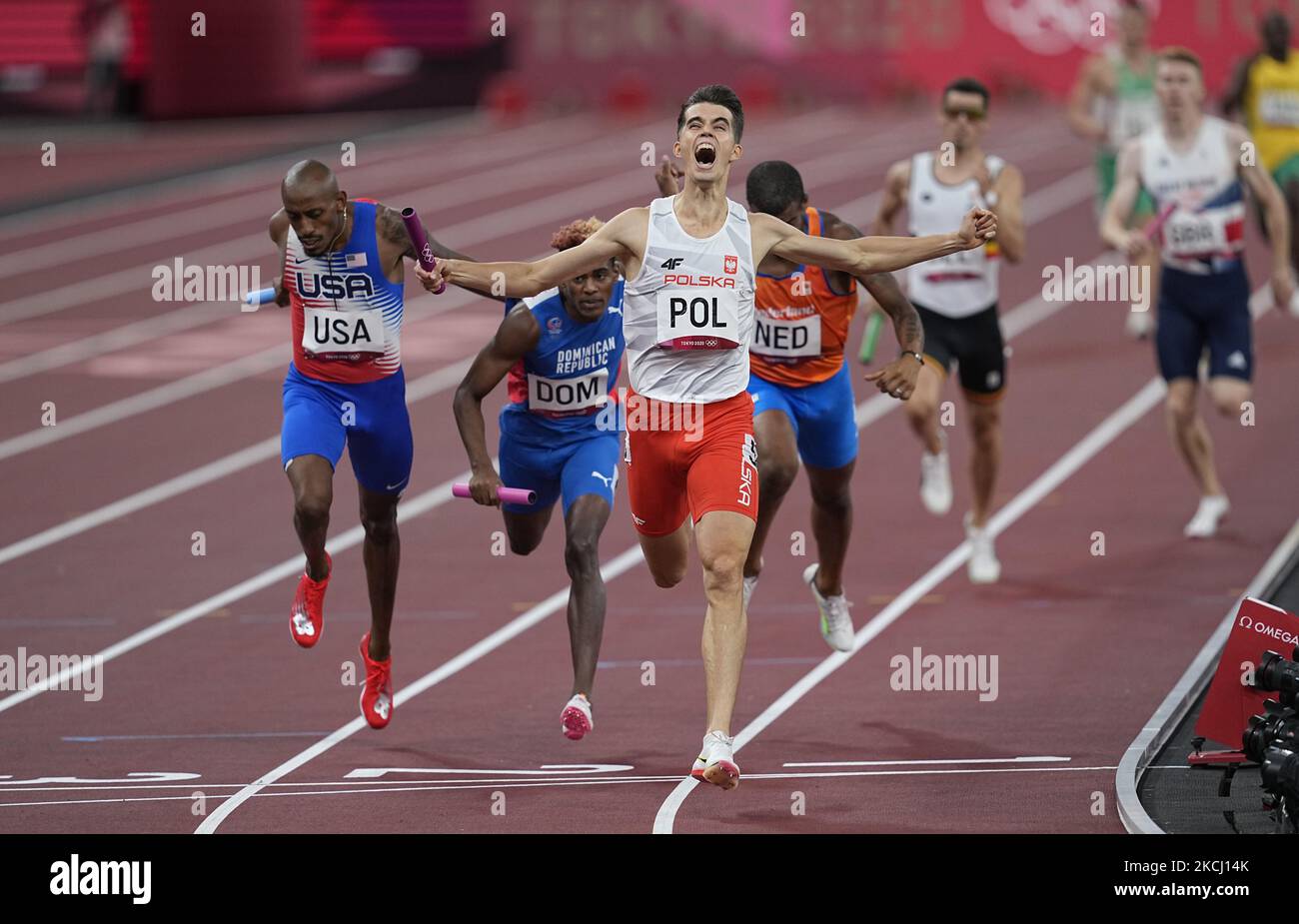 Polish team winning the 4 times 400 meter mixed relay at the Tokyo ...