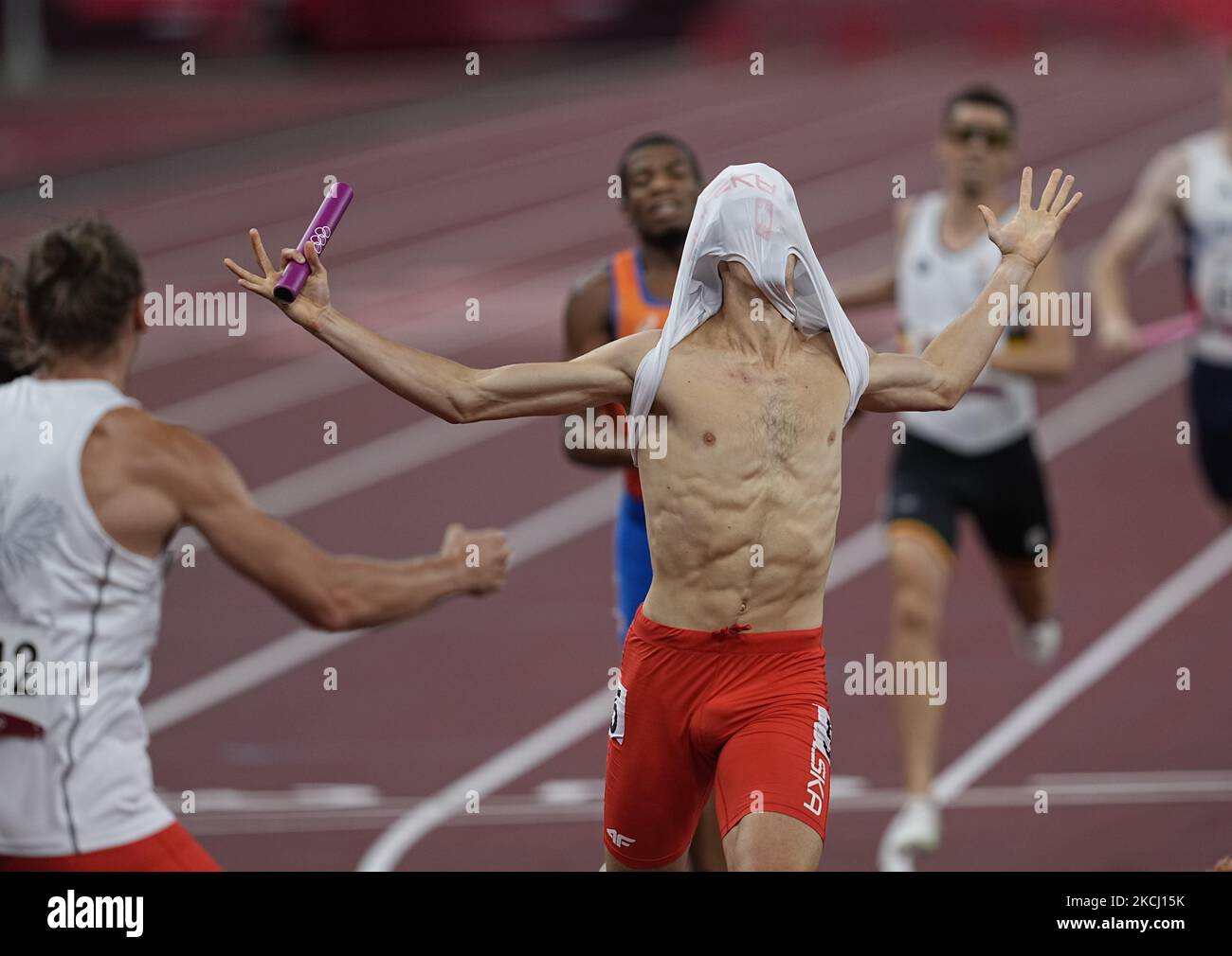 Polish team winning the 4 times 400 meter mixed relay at the Tokyo ...