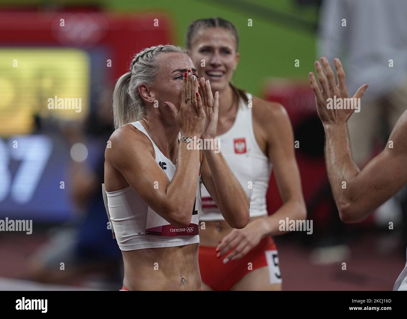 Polish team winning the 4 times 400 meter mixed relay at the Tokyo ...
