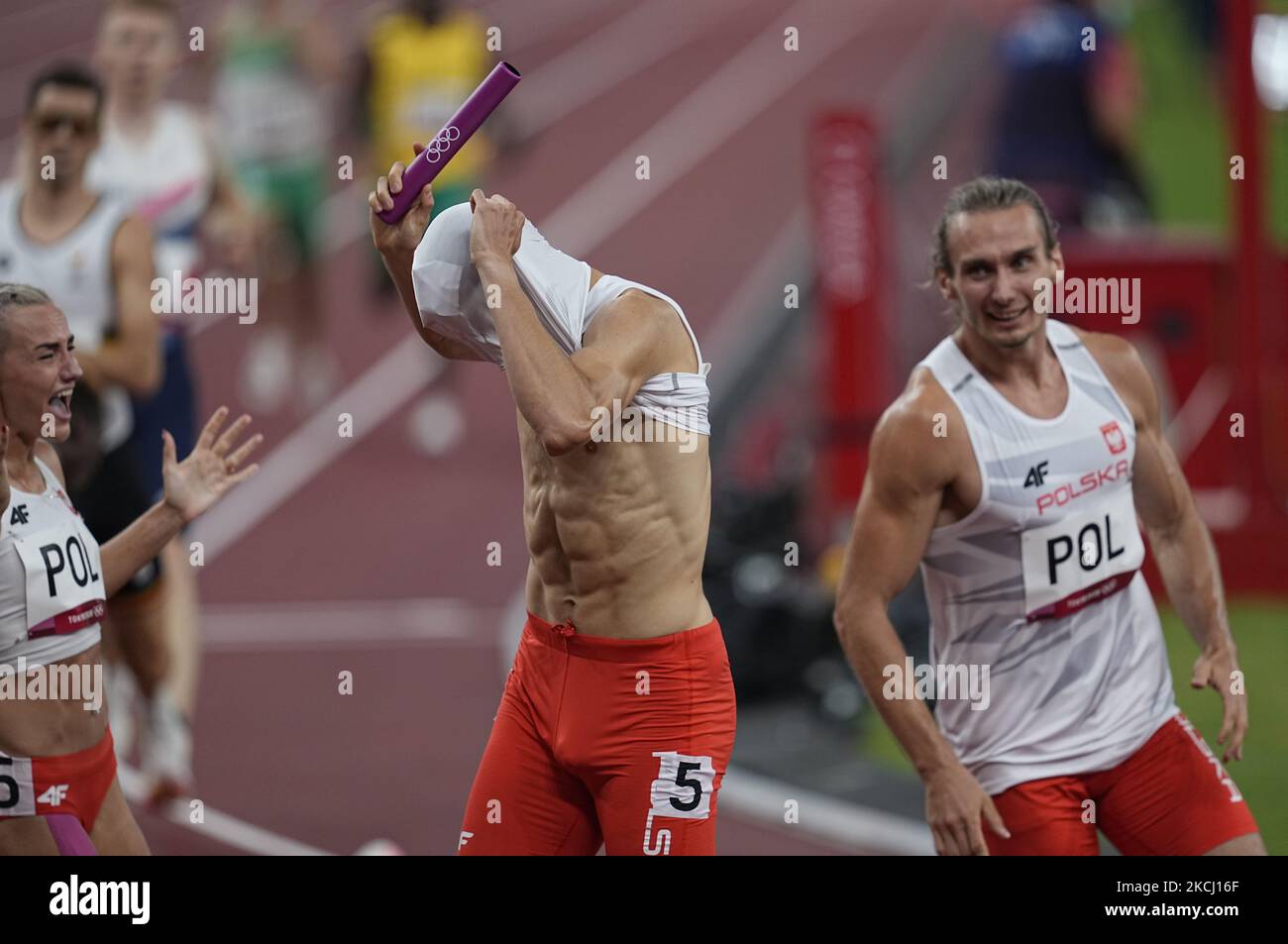 Polish team winning the 4 times 400 meter mixed relay at the Tokyo ...