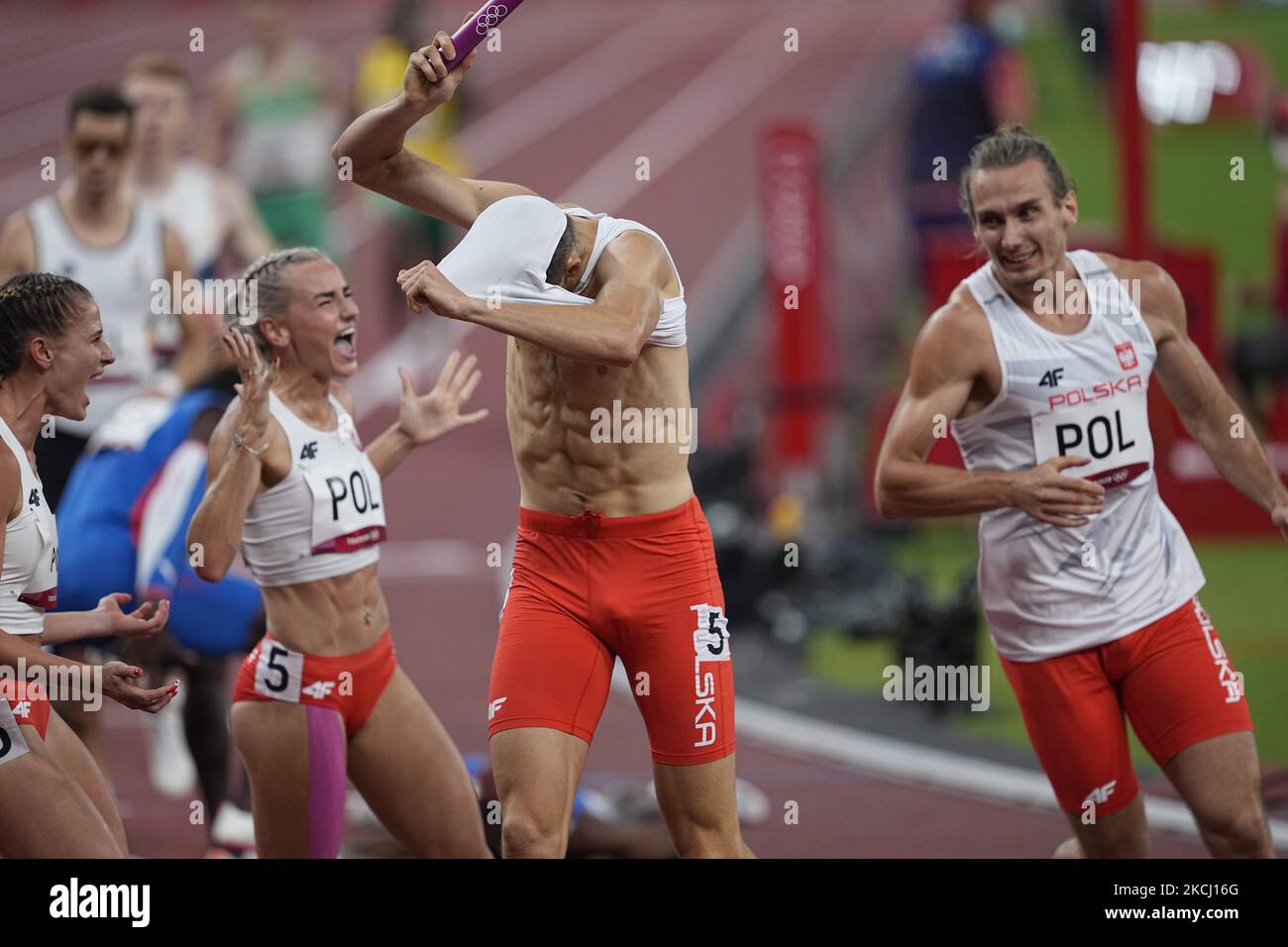 Polish team winning the 4 times 400 meter mixed relay at the Tokyo ...