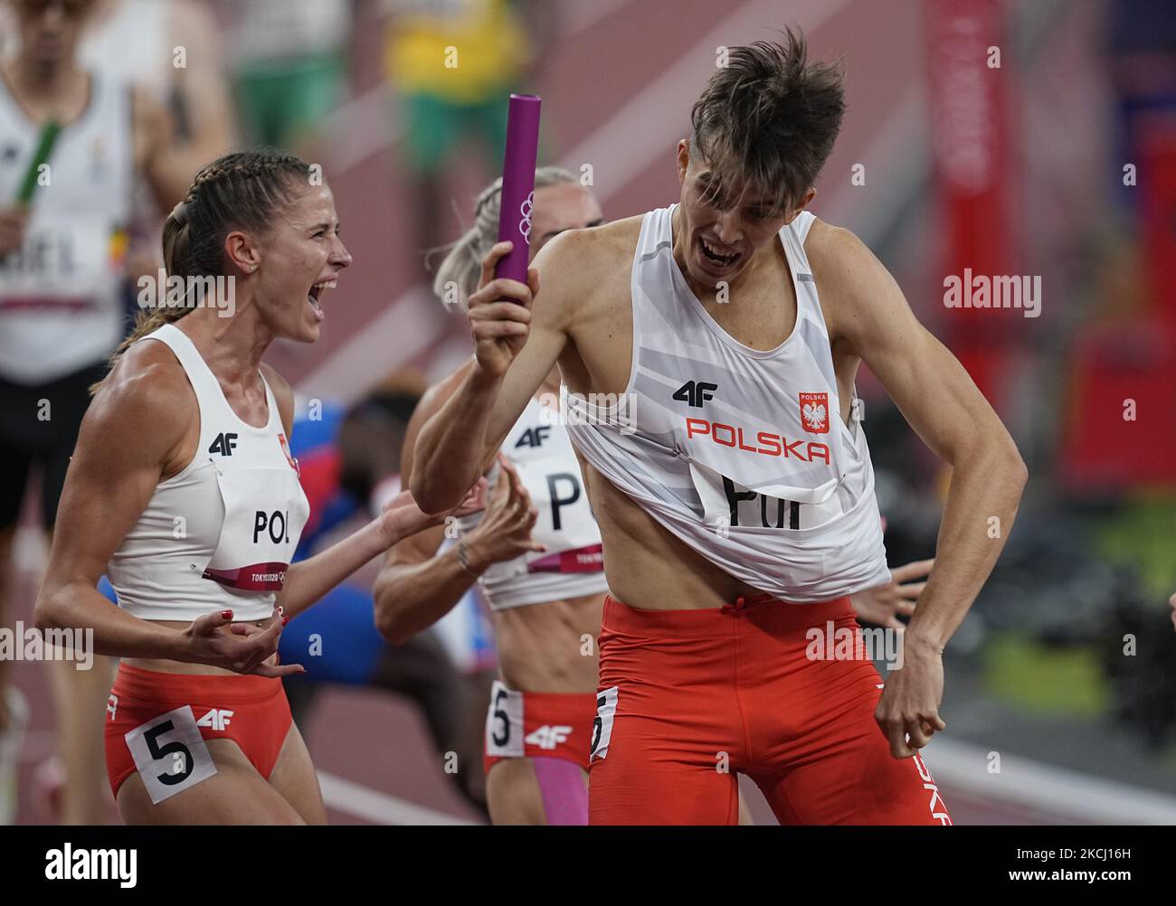 Polish team winning the 4 times 400 meter mixed relay at the Tokyo ...