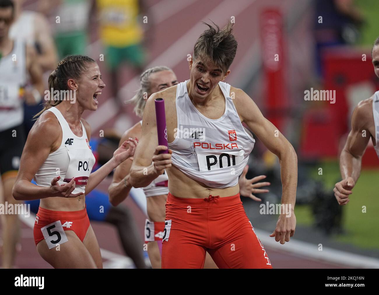 Polish team winning the 4 times 400 meter mixed relay at the Tokyo ...