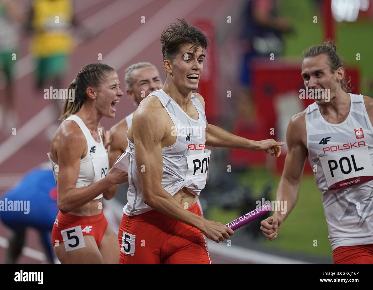Polish team winning the 4 times 400 meter mixed relay at the Tokyo ...