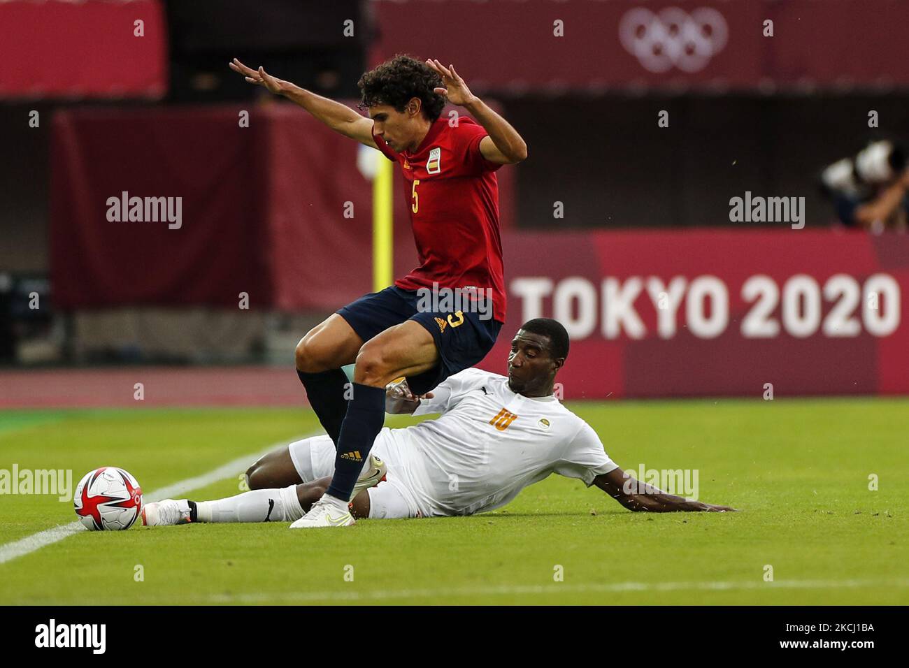 (18) Cheick TIMITE of Team Cote d'Ivoire is challenged by (5) Jesus VALLEJO of Team Spain during ...