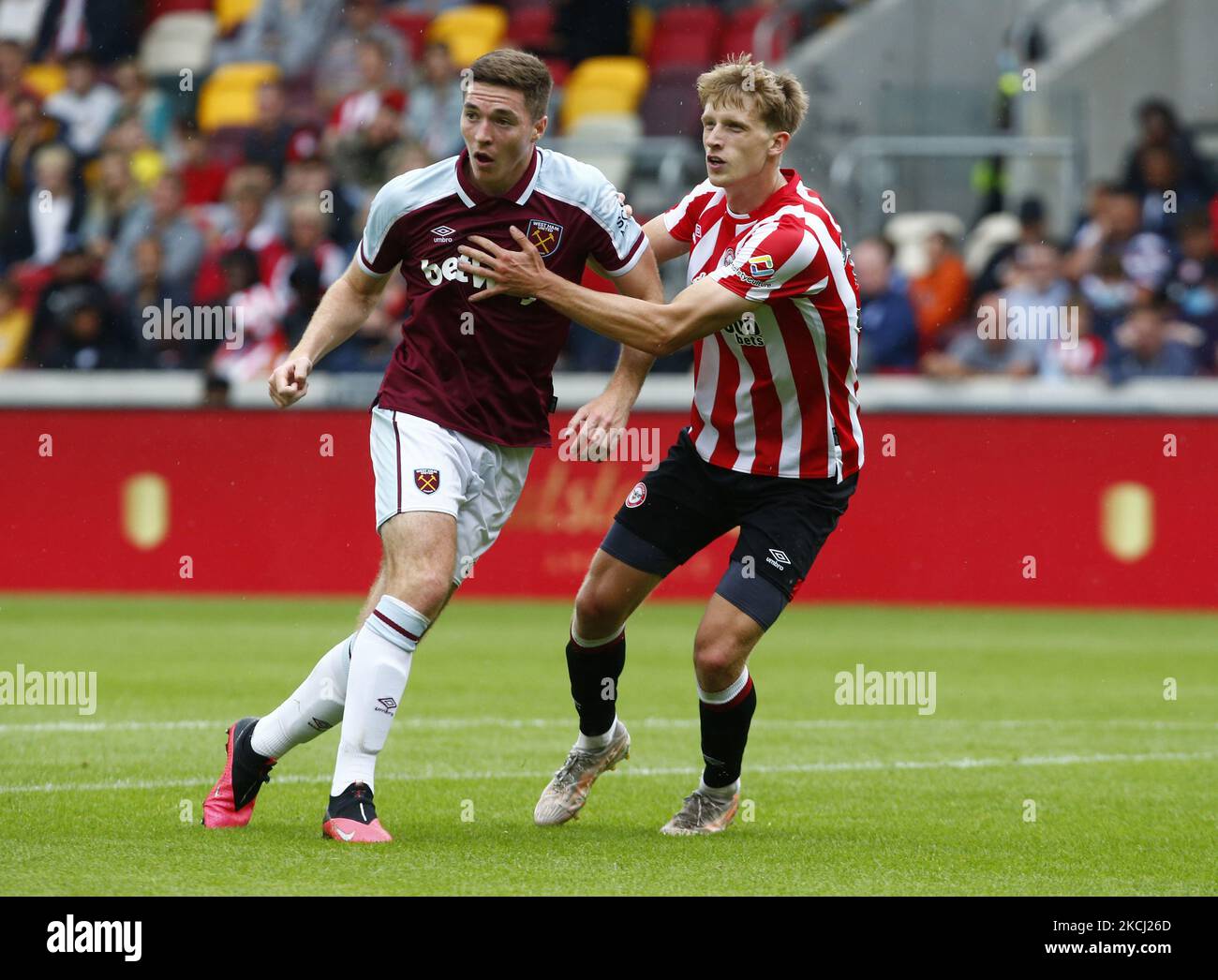 L-R West Ham United's Conor Coventry and Mads Roerslev of Brentford ...