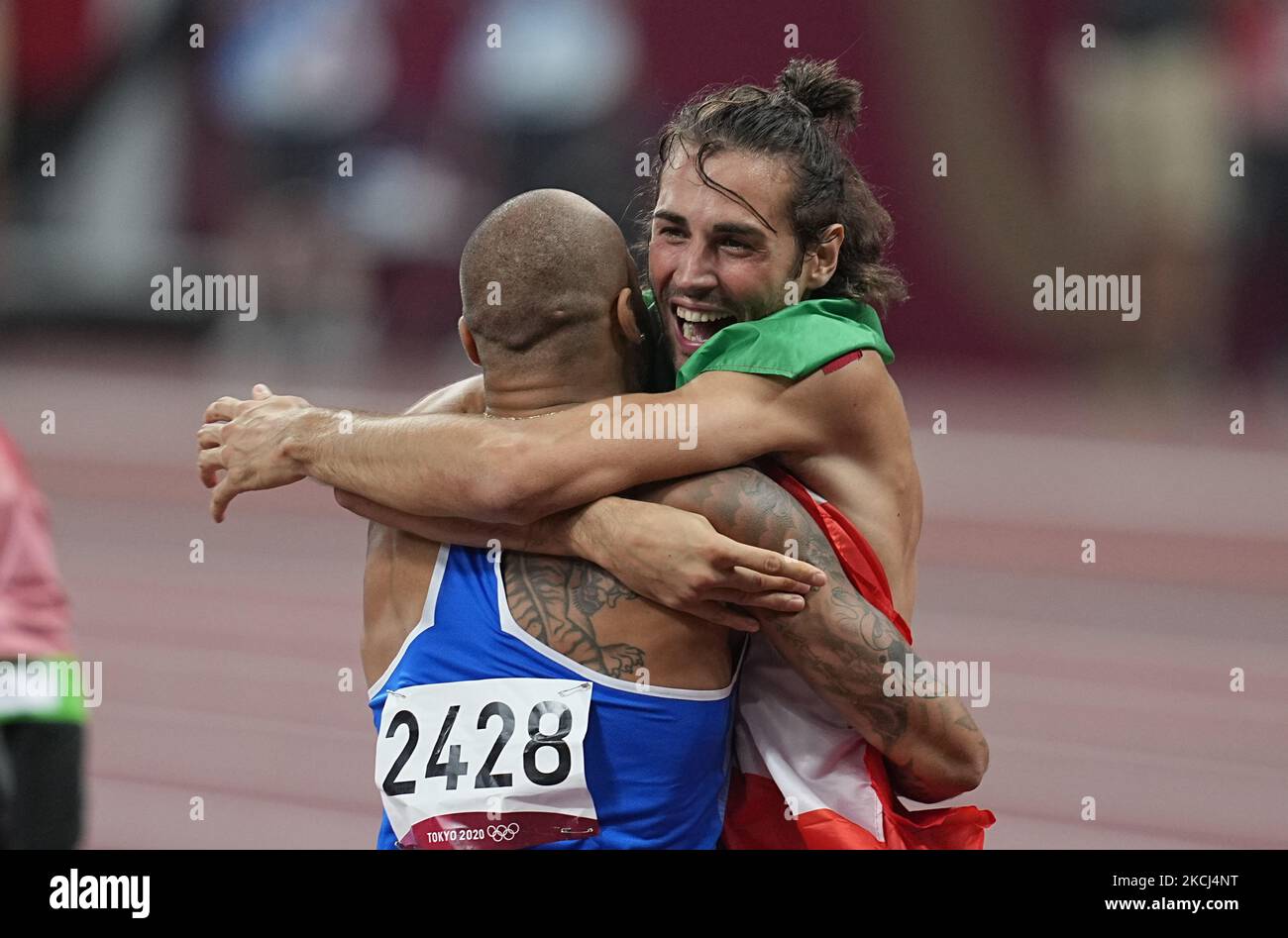 Gianmarco Tamberi and Lamont Marcell Jacobs celebrating100 meter win ...