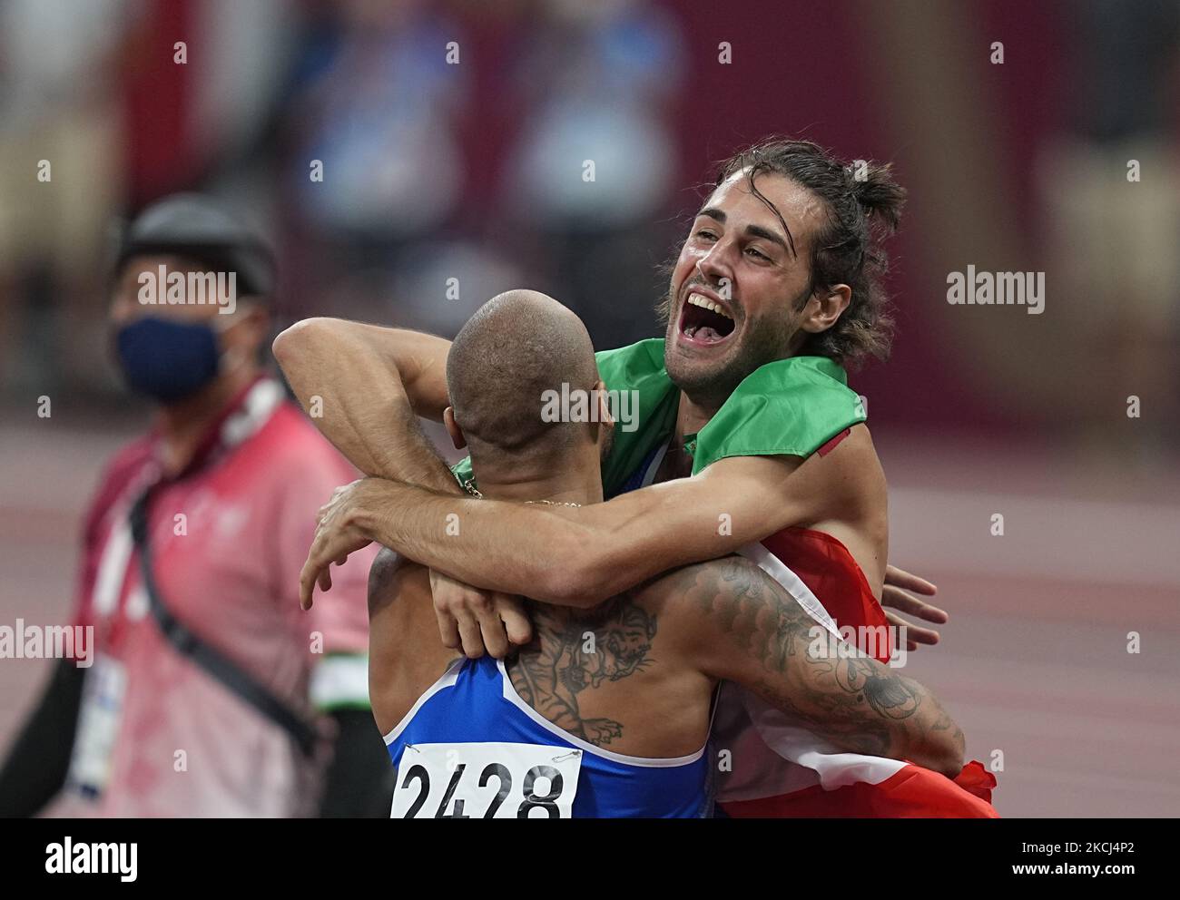 Gianmarco Tamberi and Lamont Marcell Jacobs celebrating100 meter win ...
