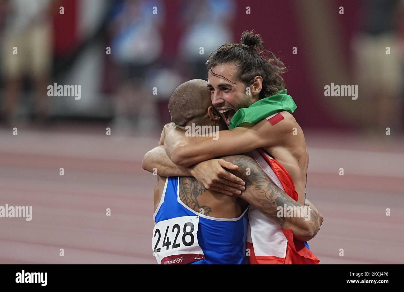 Gianmarco Tamberi and Lamont Marcell Jacobs celebrating100 meter win ...