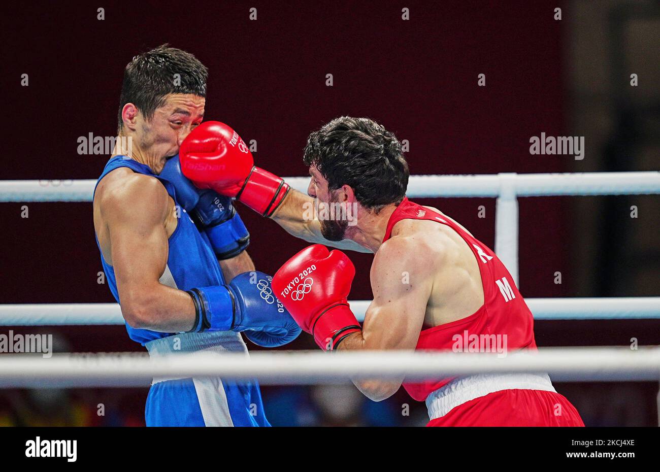 Hovhannes Bachkov against Elnur Abduraimov during boxing at the Tokyo ...