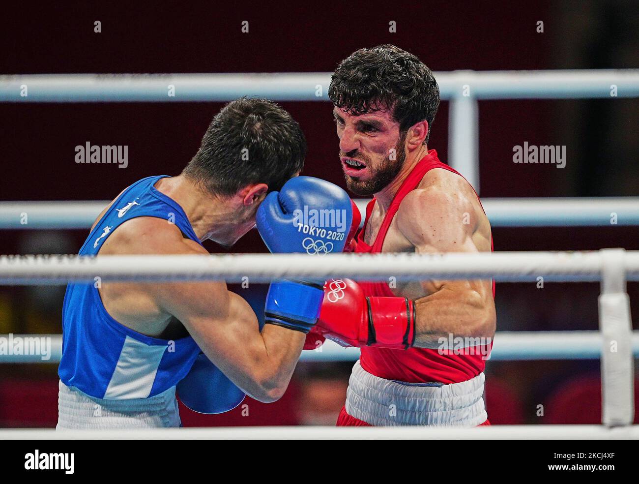 Hovhannes Bachkov against Elnur Abduraimov during boxing at the Tokyo ...