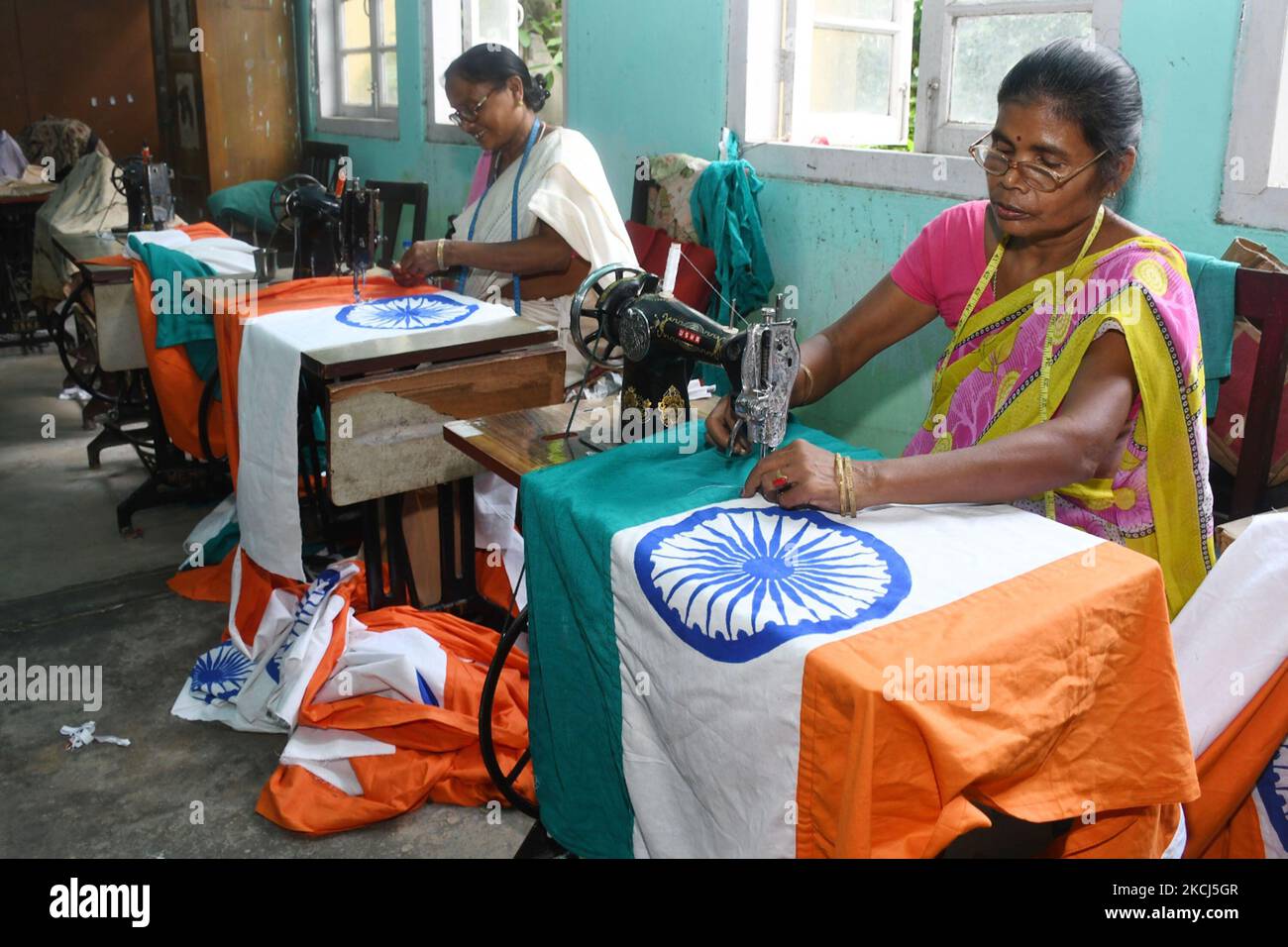 Women stitching National Flags of India ahead of the celebration of the ...
